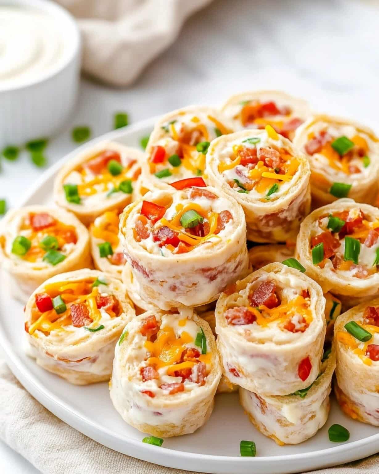 Cheddar Bacon Ranch Cream Cheese Pinwheels Recipe - LazyDayRecipes